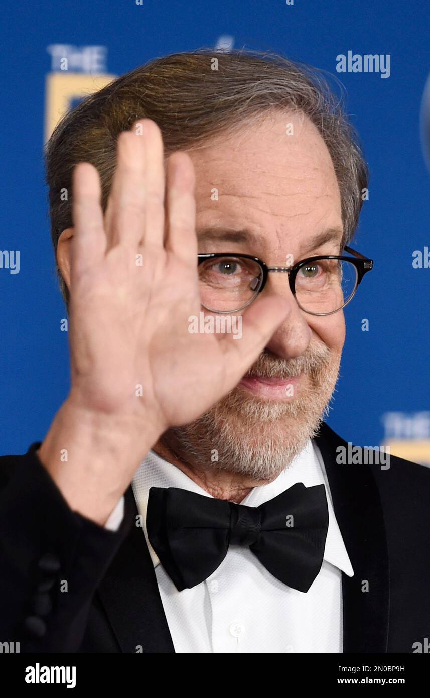Director Steven Spielberg waves to photographers at the 68th Directors ...