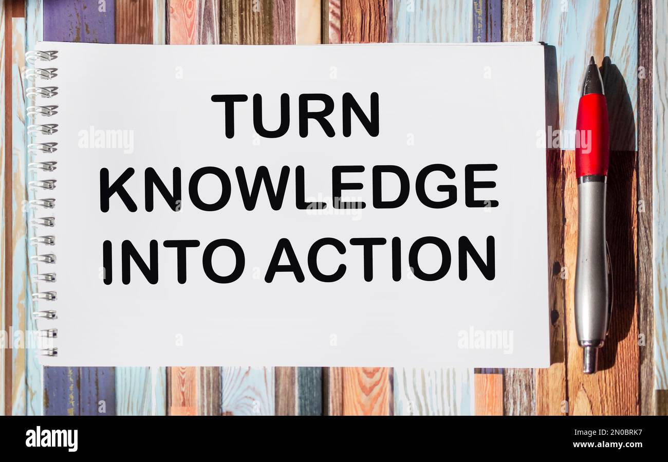 Business concept. On the vintage table lies a notepad with the ...