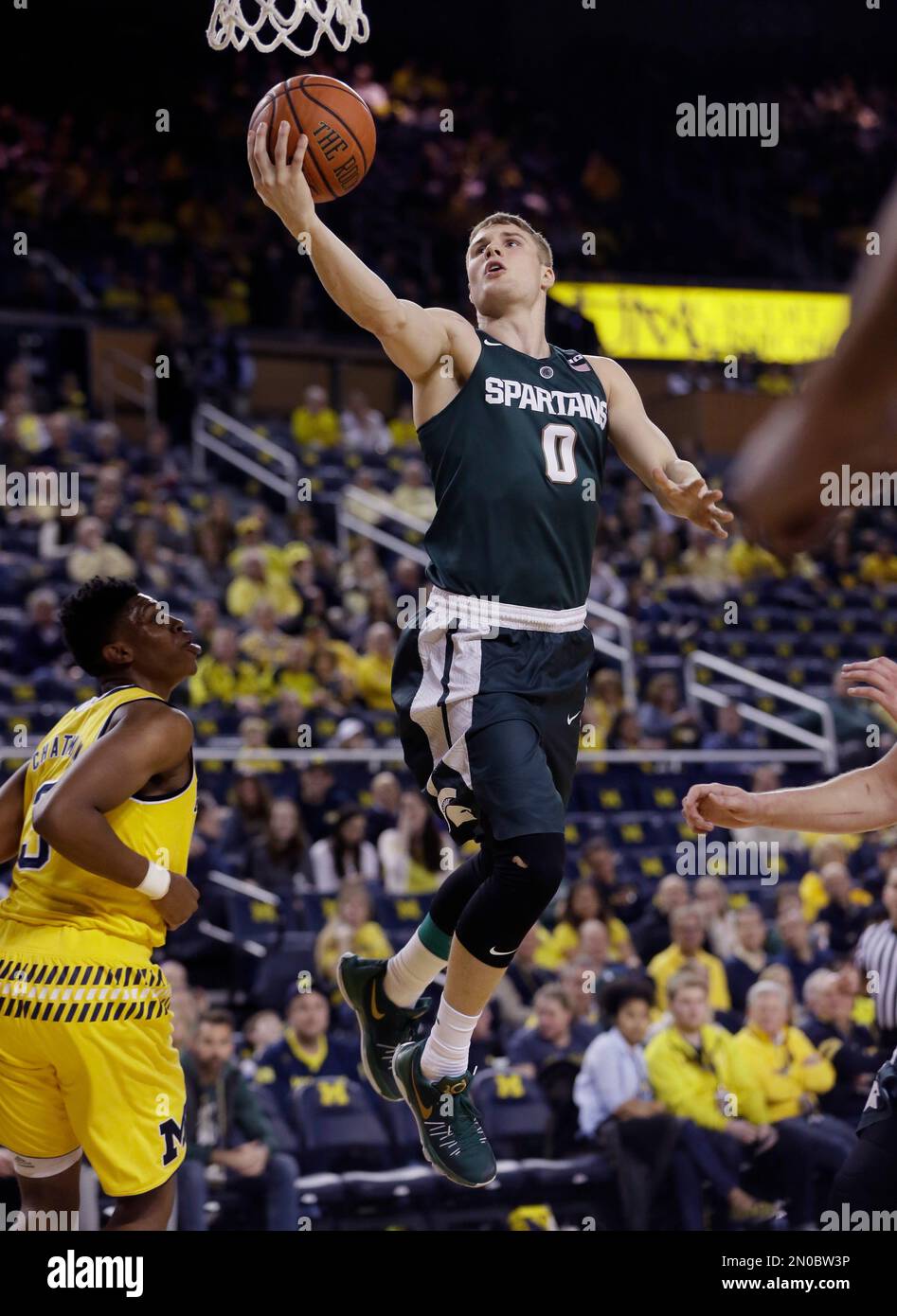 Michigan State guard Kyle Ahrens makes a layup during the second half ...