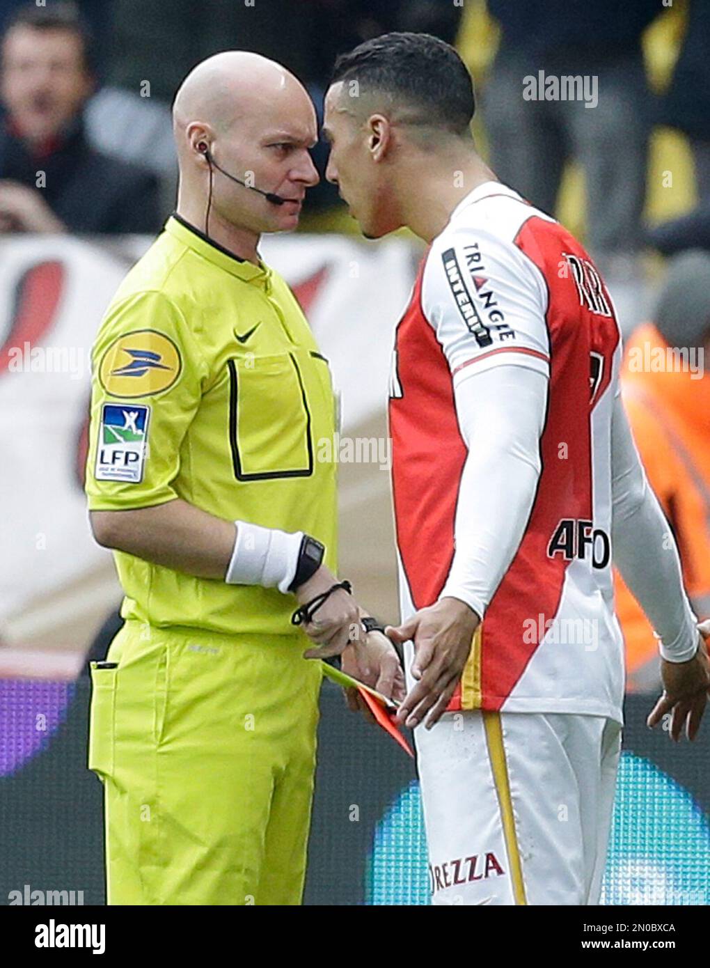 Monaco's Nabil Dirar received a red card from the referree Tony Chapron during their French ...