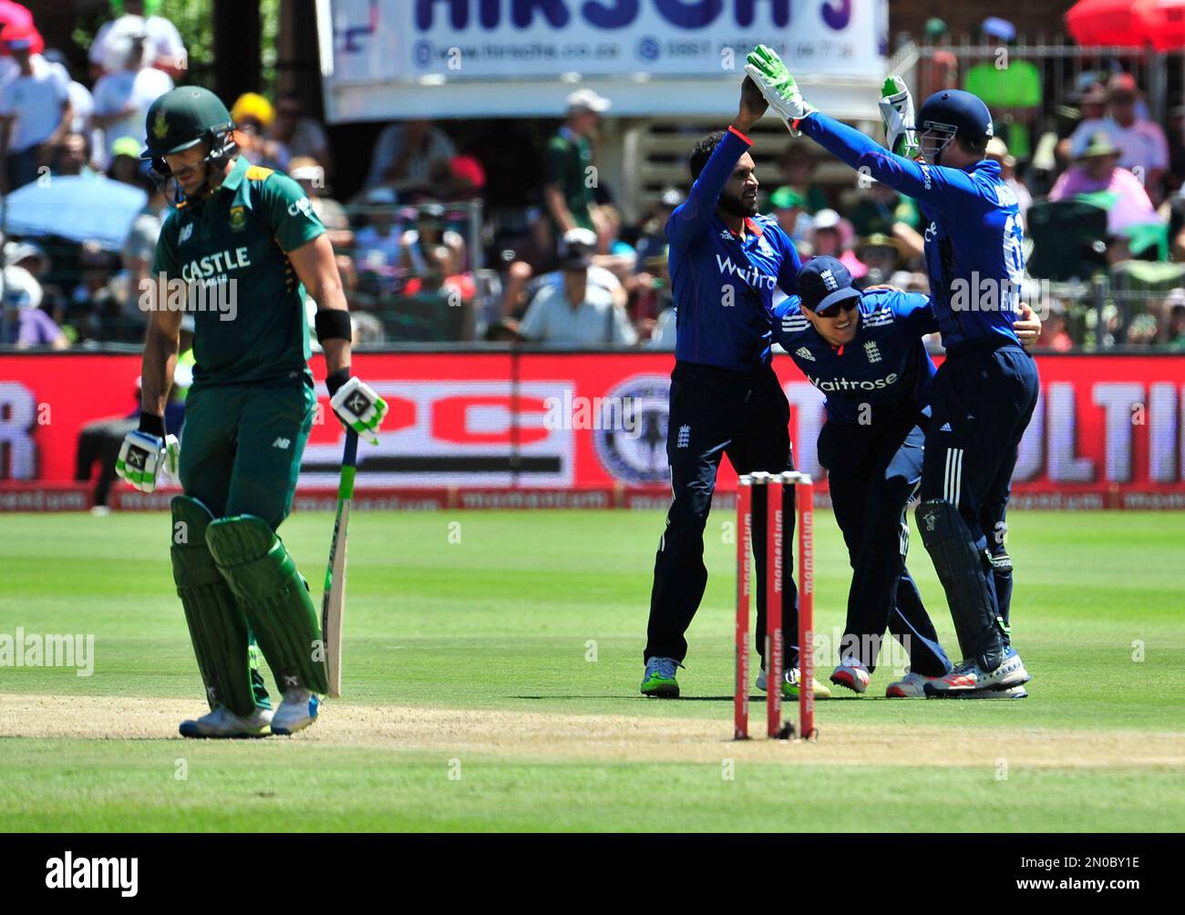 England players, right, celebrate the wicket of South Africa's Faf du ...