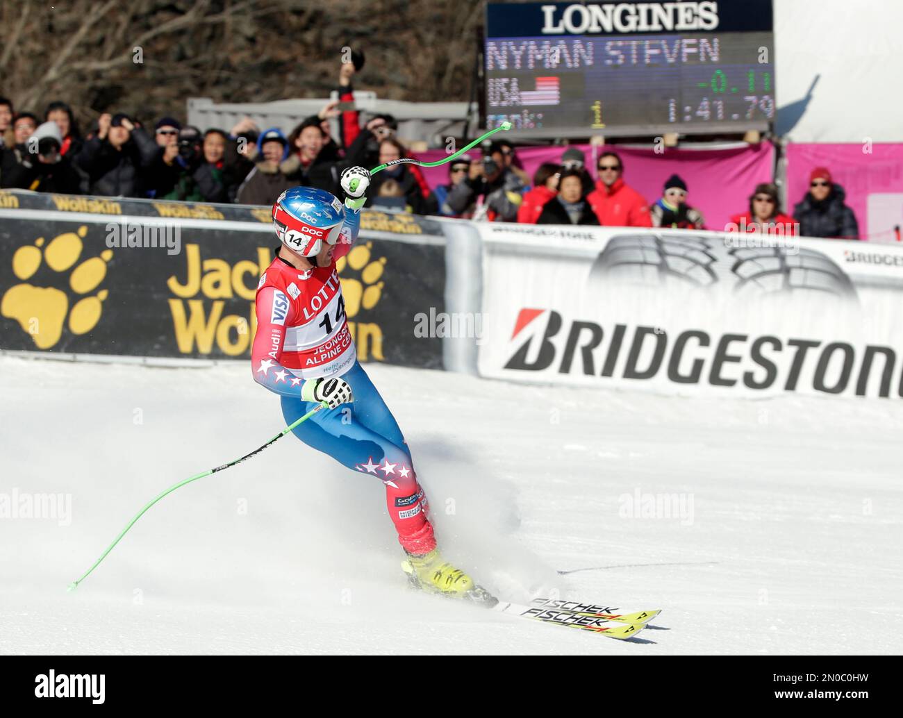 Third-place finisher Steven Nyman of the United States reacts after ...
