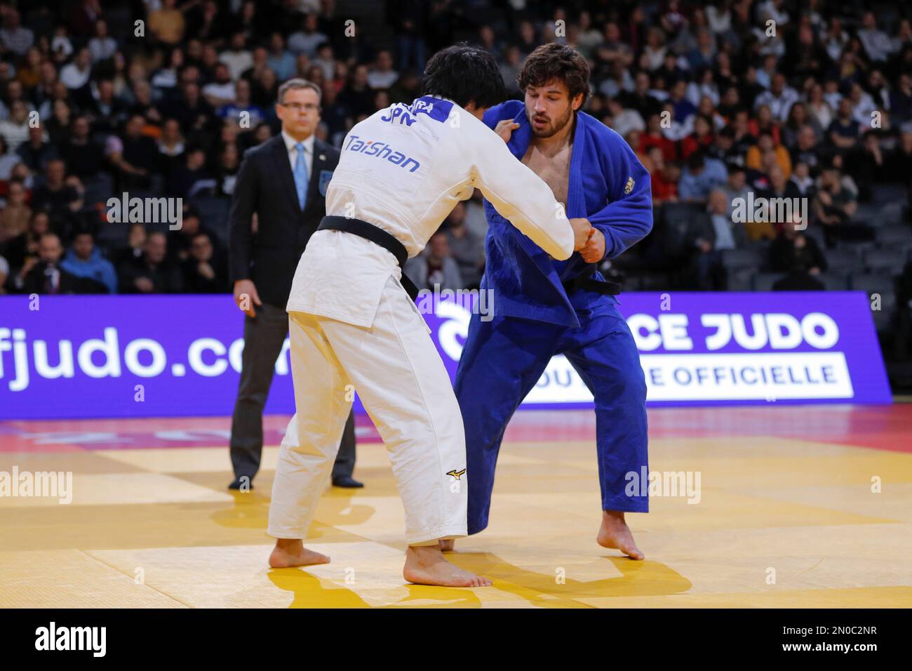 Etienne Briand (CAN) competed against Kenya Kohara (JPN) during the ...