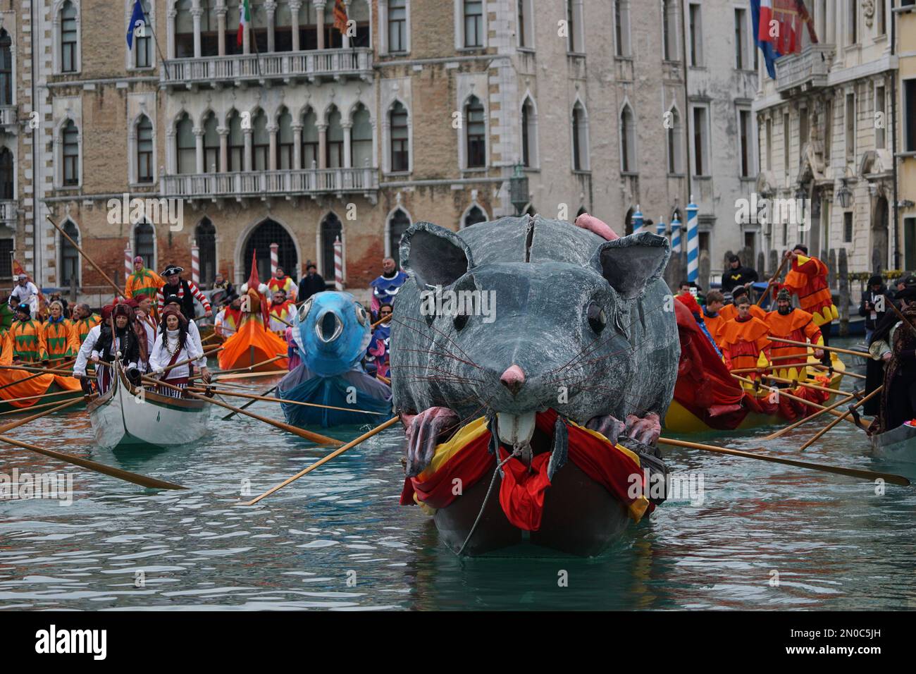 Performers wearing costumes during the “ Pantegana Regatta “ of the ...