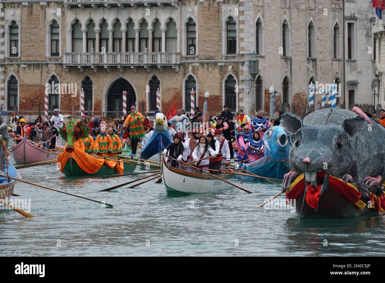 Performers wearing costumes during the “ Pantegana Regatta “ of the ...