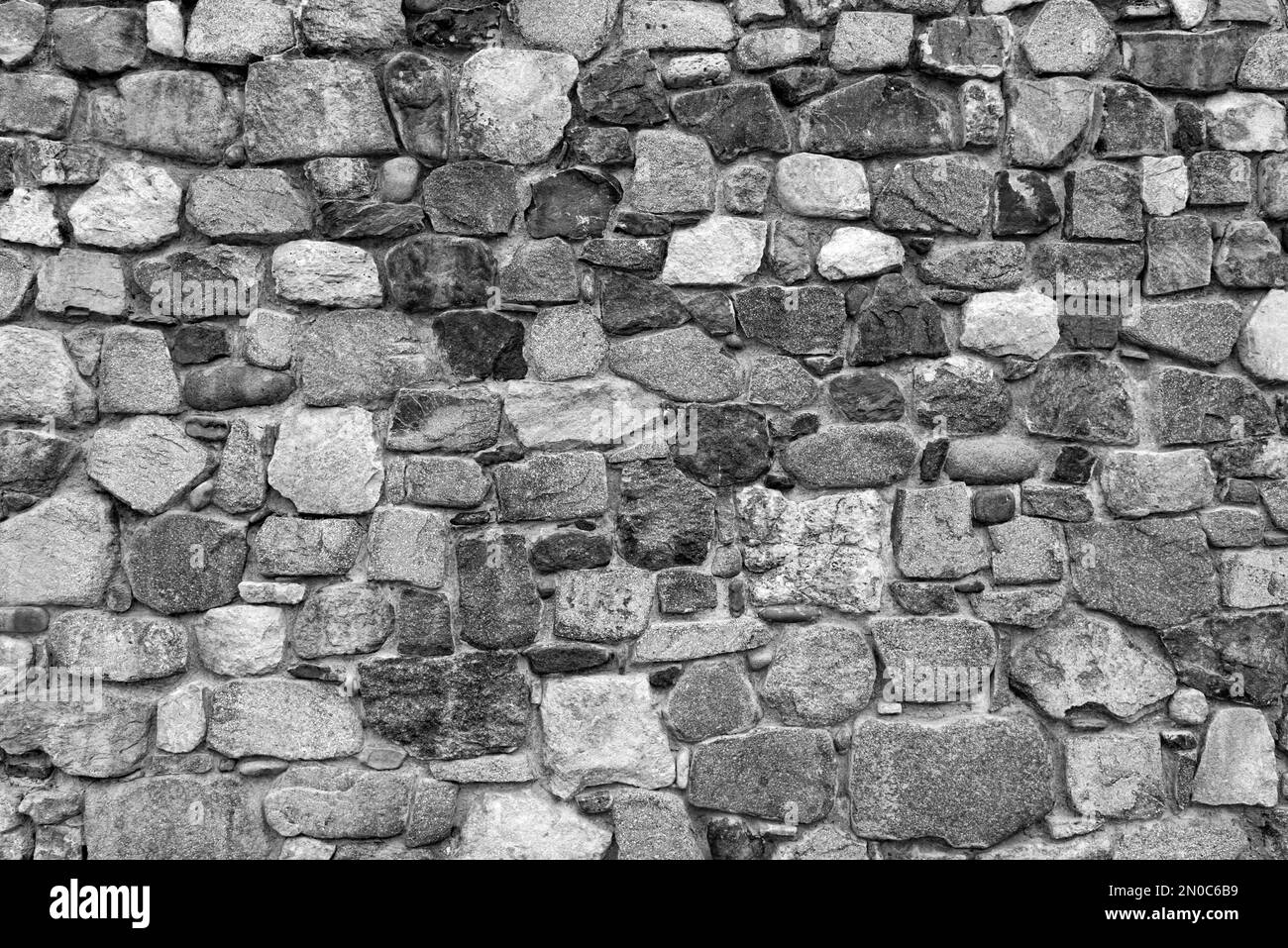 Stone masonry wall as an background Stock Photo - Alamy