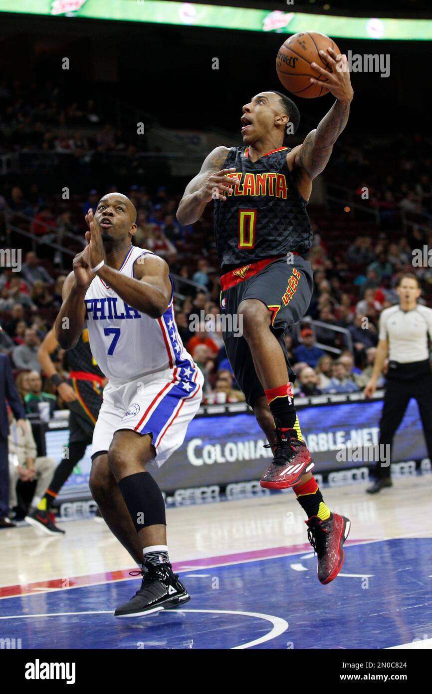 Atlanta Hawks' Jeff Teague (0) goes up for the shot with Philadelphia ...