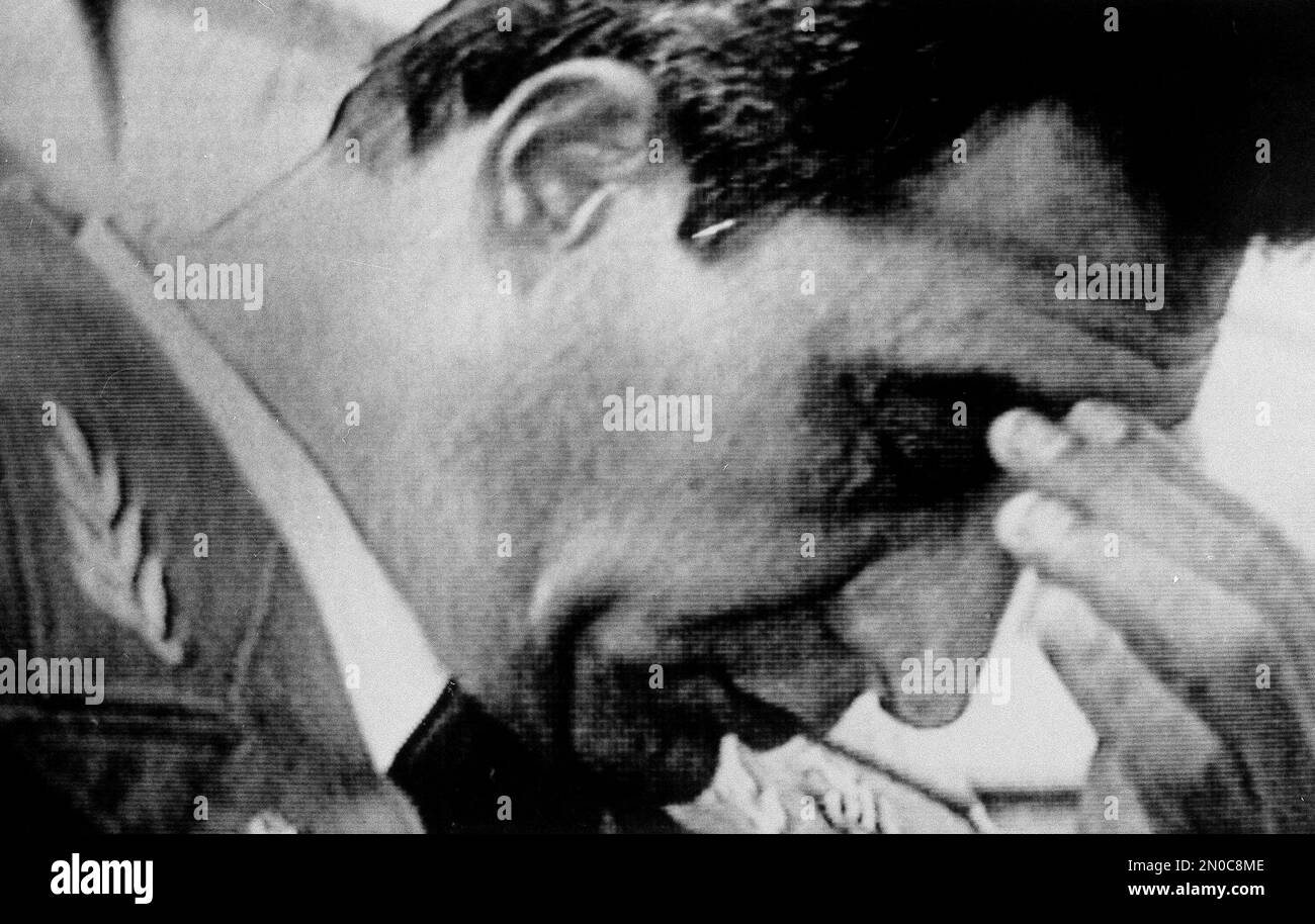 Cuban Maj. Gen. Arnaldo Ochoa closes his eyes in this photo taken from ...