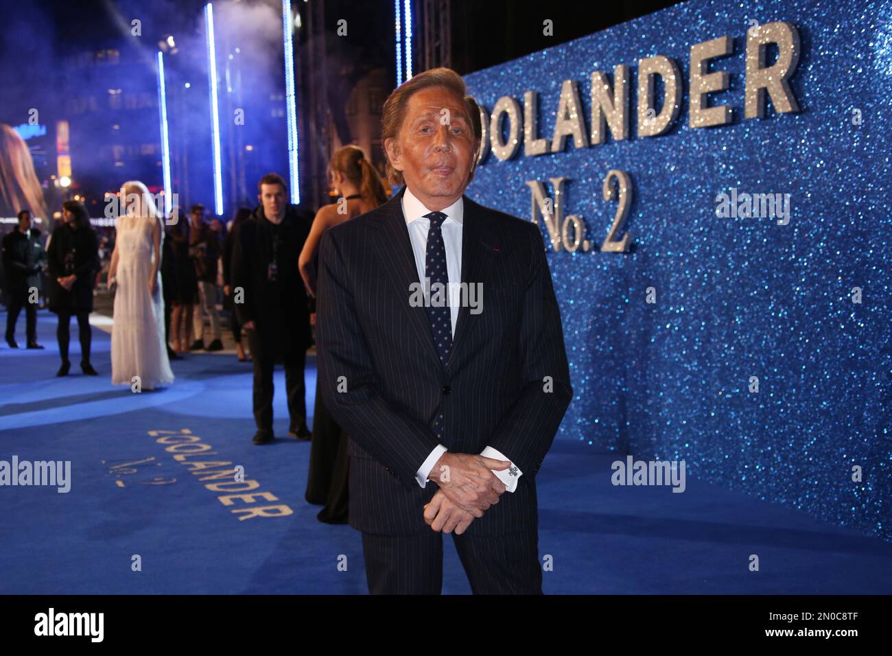 Fashion designer Valentino poses for photographers upon arrival at the ...