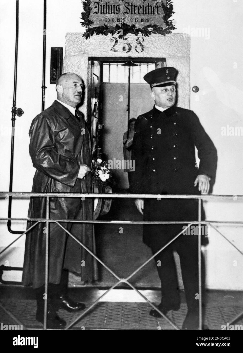 Julius Streicher, left, in front of his former cell in the prison of ...