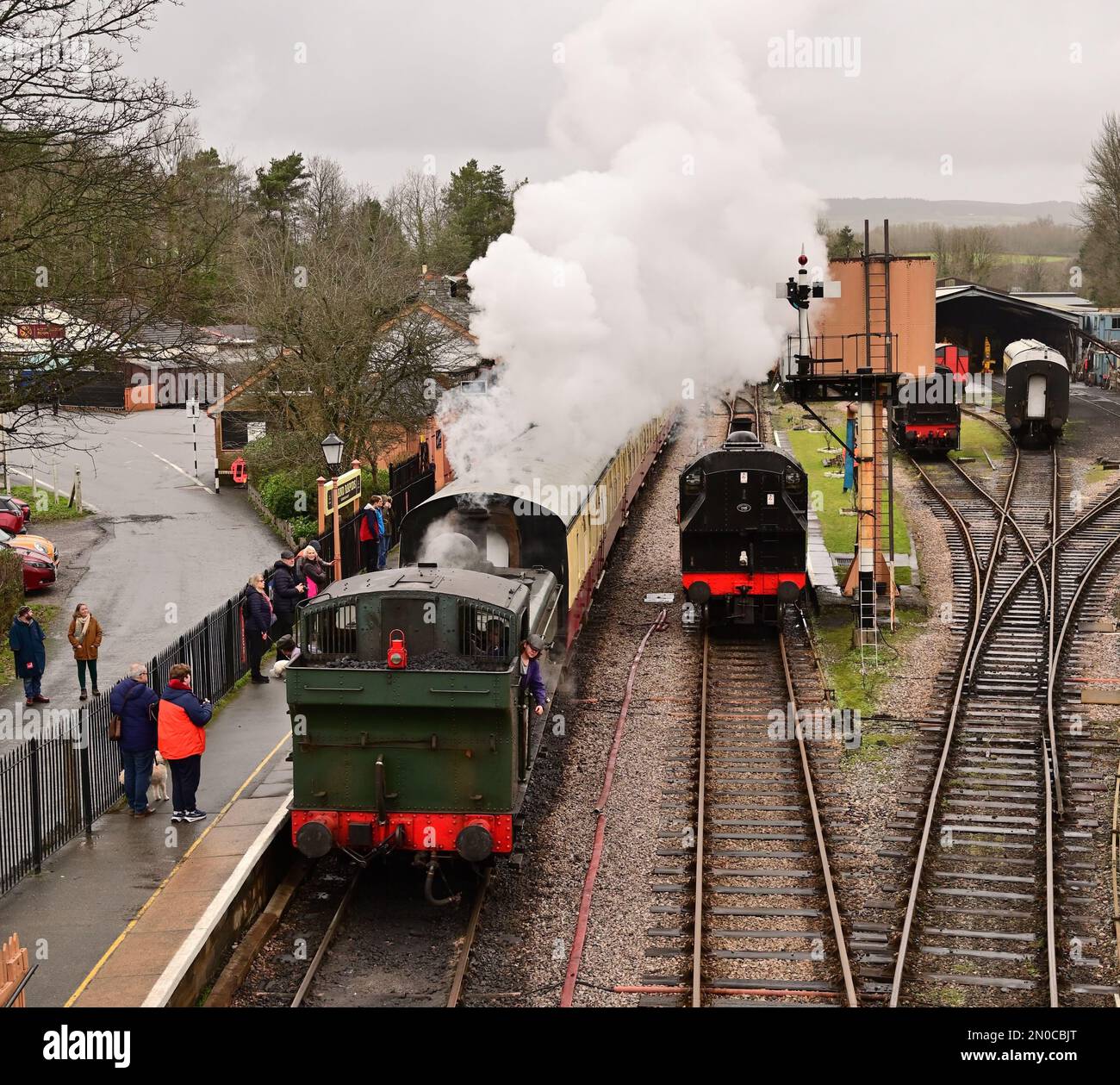 The fireman of GWR pannier tank No 6430 is preparing to collect the ...
