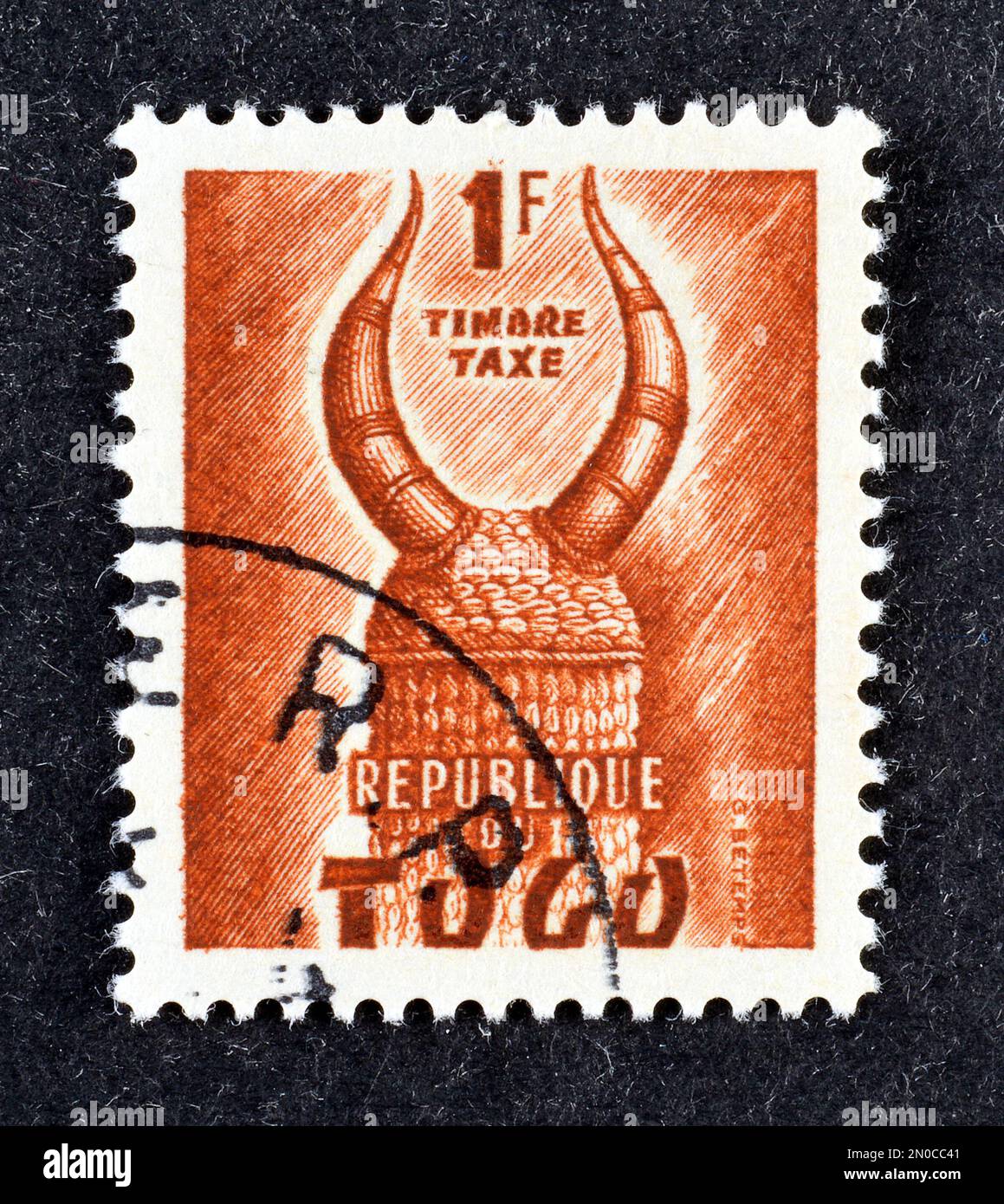 Postage stamp printed by Togo, that shows Helmet, circa 1959 Stock ...