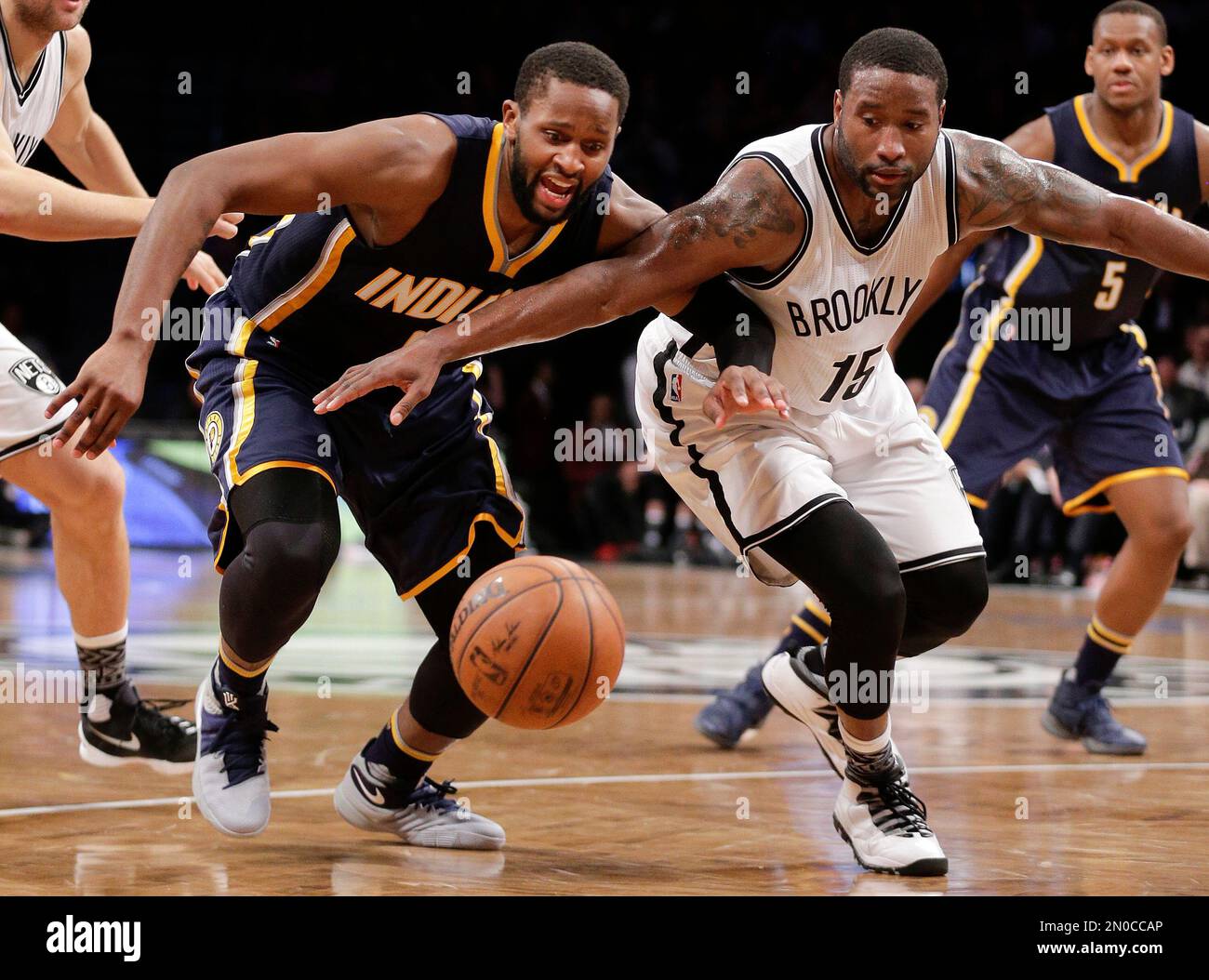 Indiana Pacers forward C.J. Miles (0) and Brooklyn Nets guard Donald ...