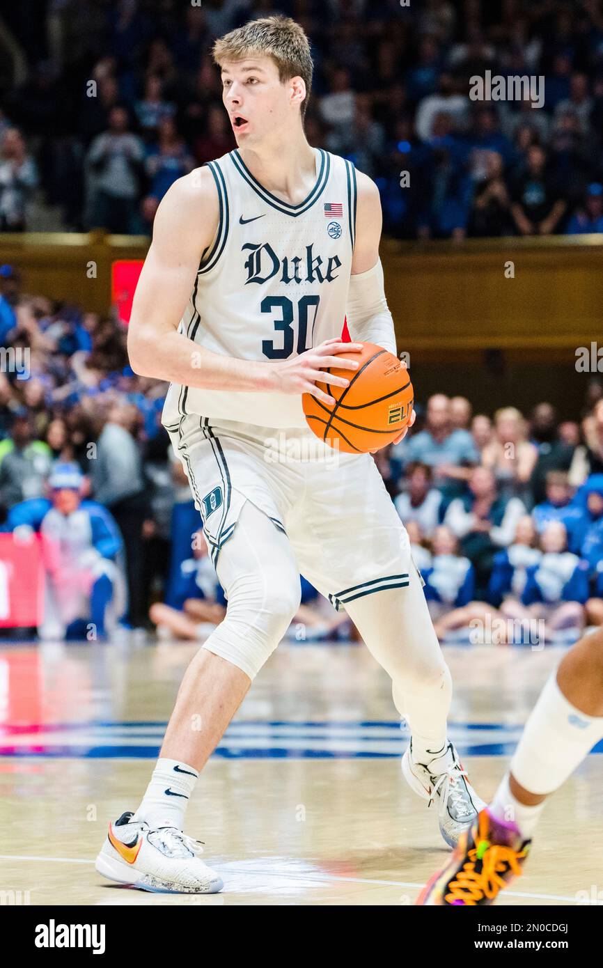 Duke center Kyle Filipowski (30) brings the ball up court against North ...