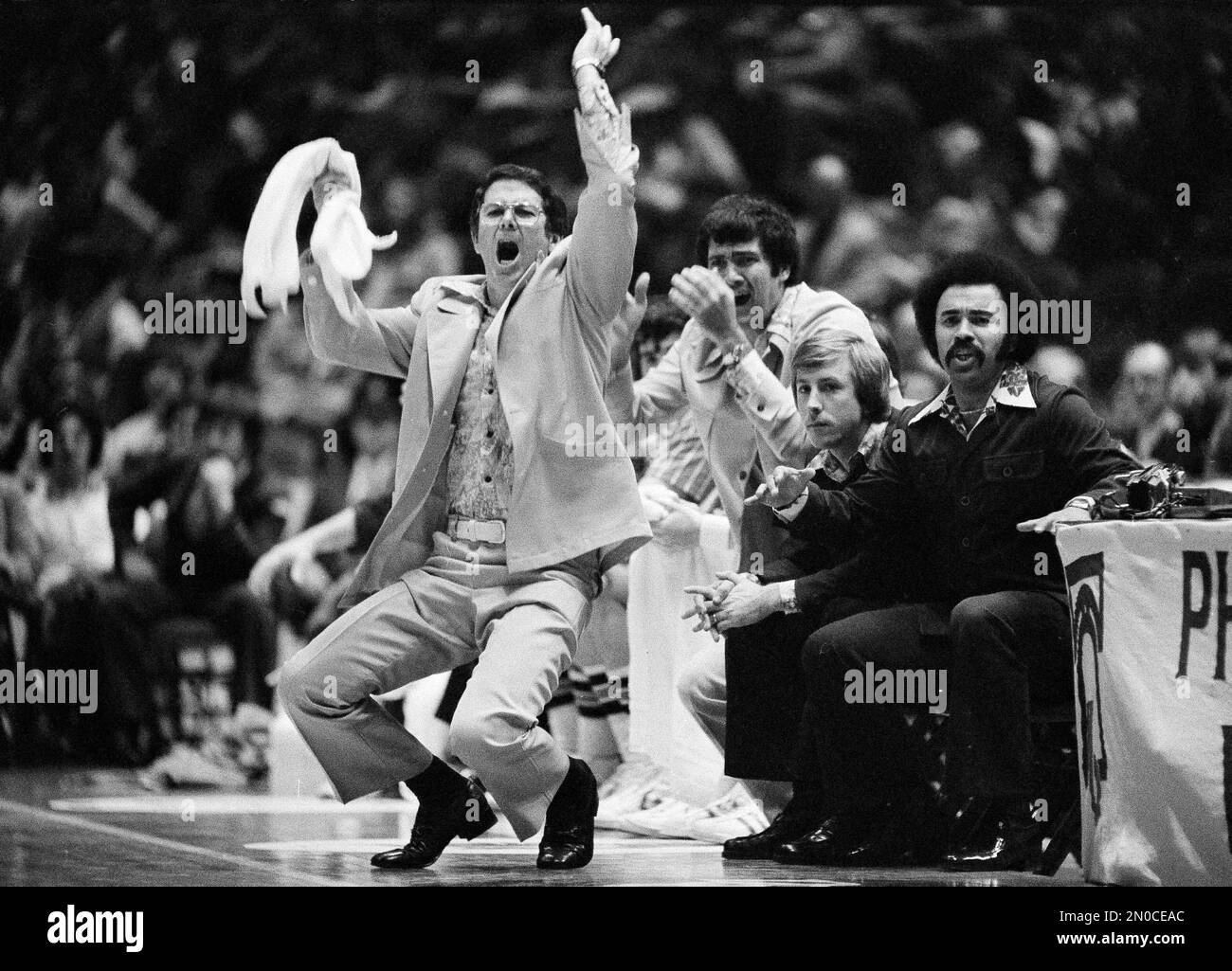 Rutgers' head coach Tom Young expresses his feelings as he shouts from ...