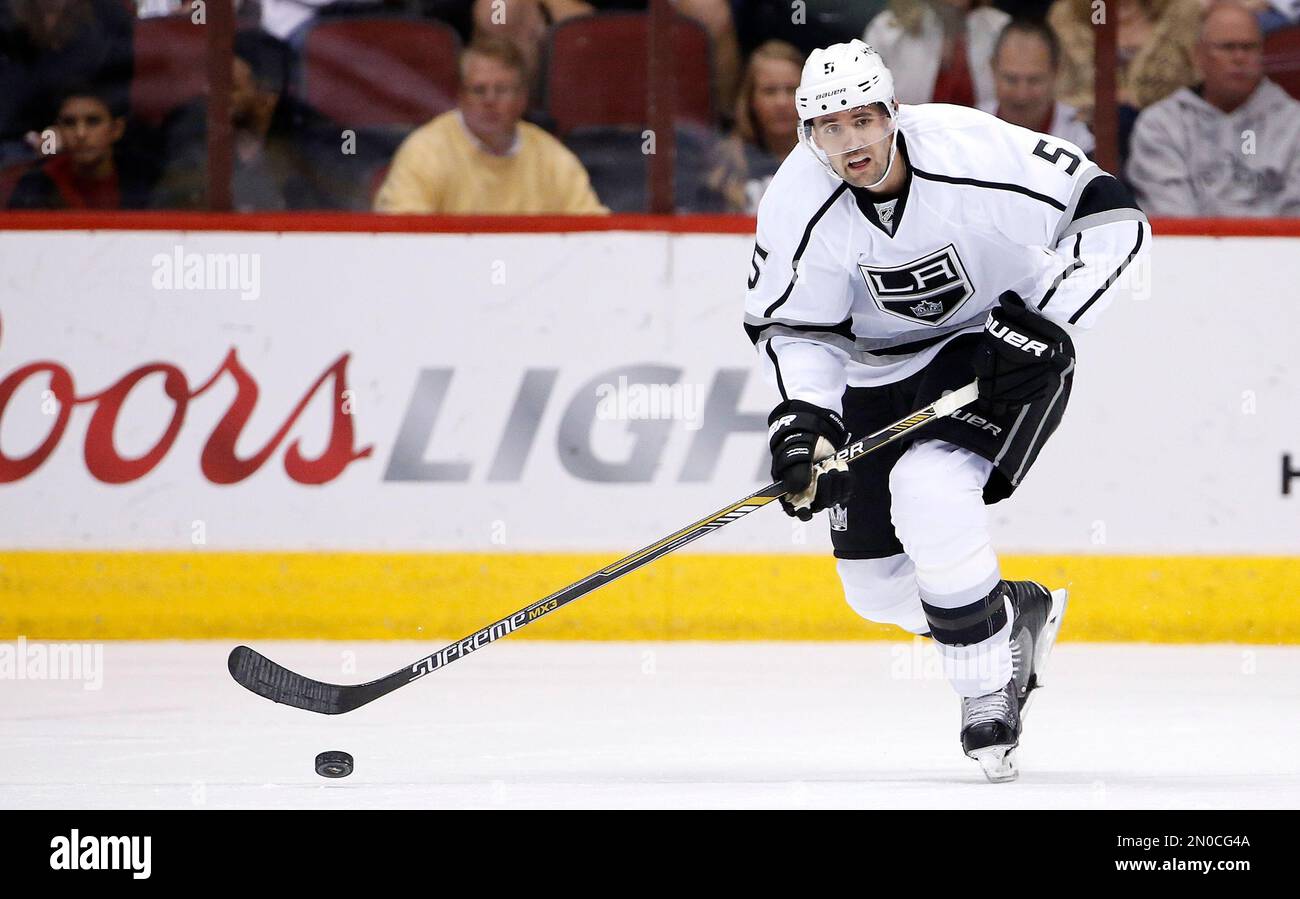 Los Angeles Kings' Jamie McBain skates with the puck against the ...
