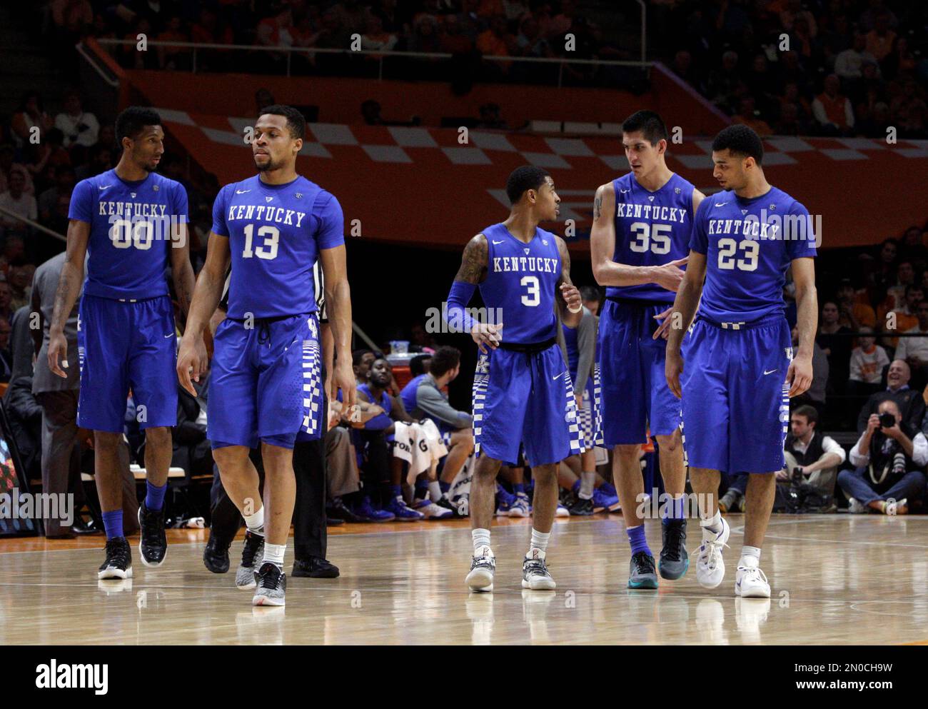 Kentucky forward Marcus Lee (00), guard Tyler Ulis (3), forward Derek ...