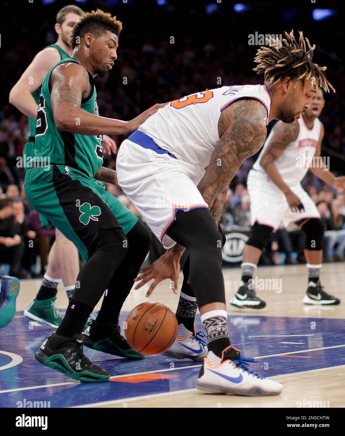 New York Knicks forward Derrick Williams (23) loses control of the ball ...