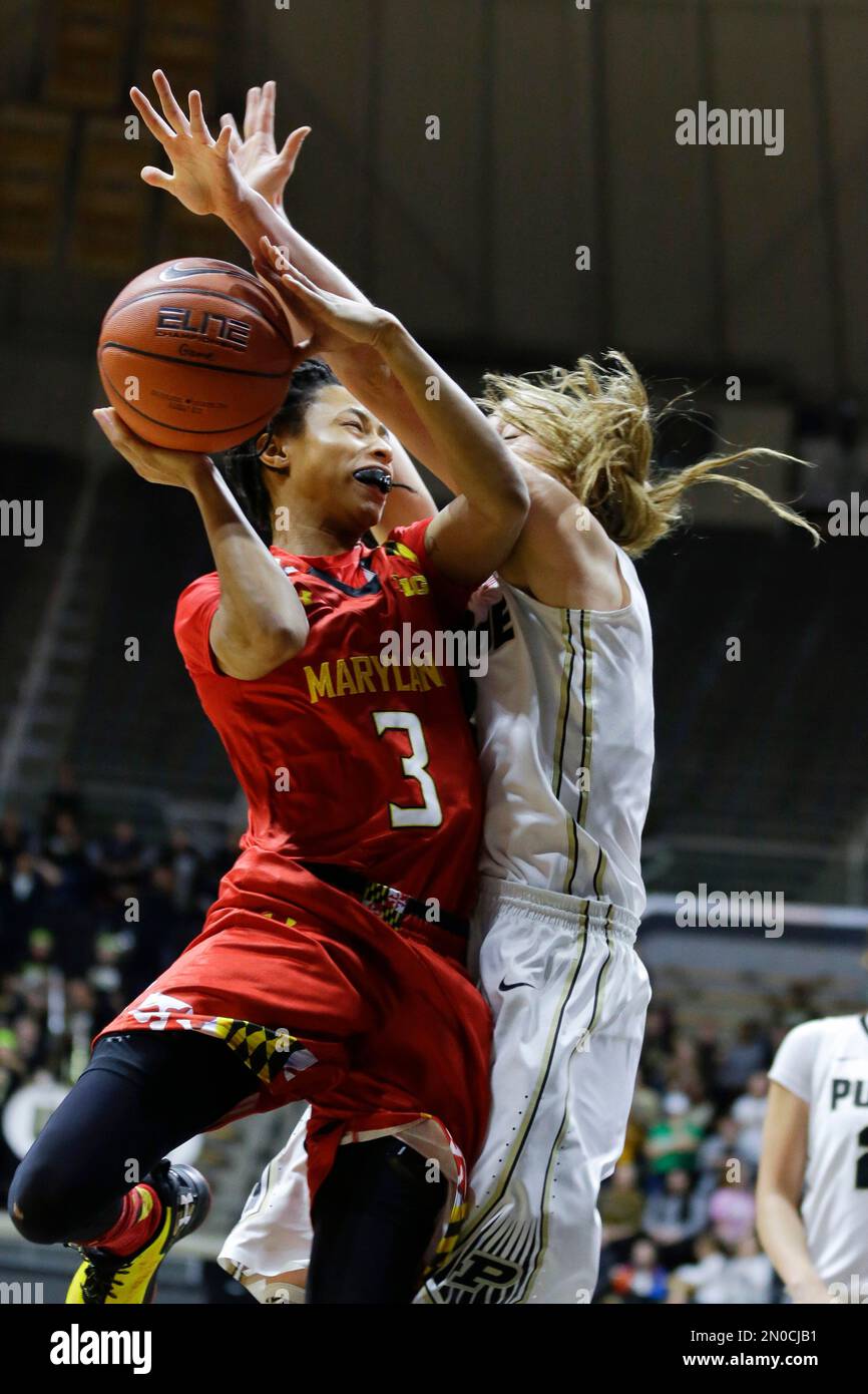 Purdue guard Bridget Perry (13) fouls Maryland guard Brene Moseley (3 ...