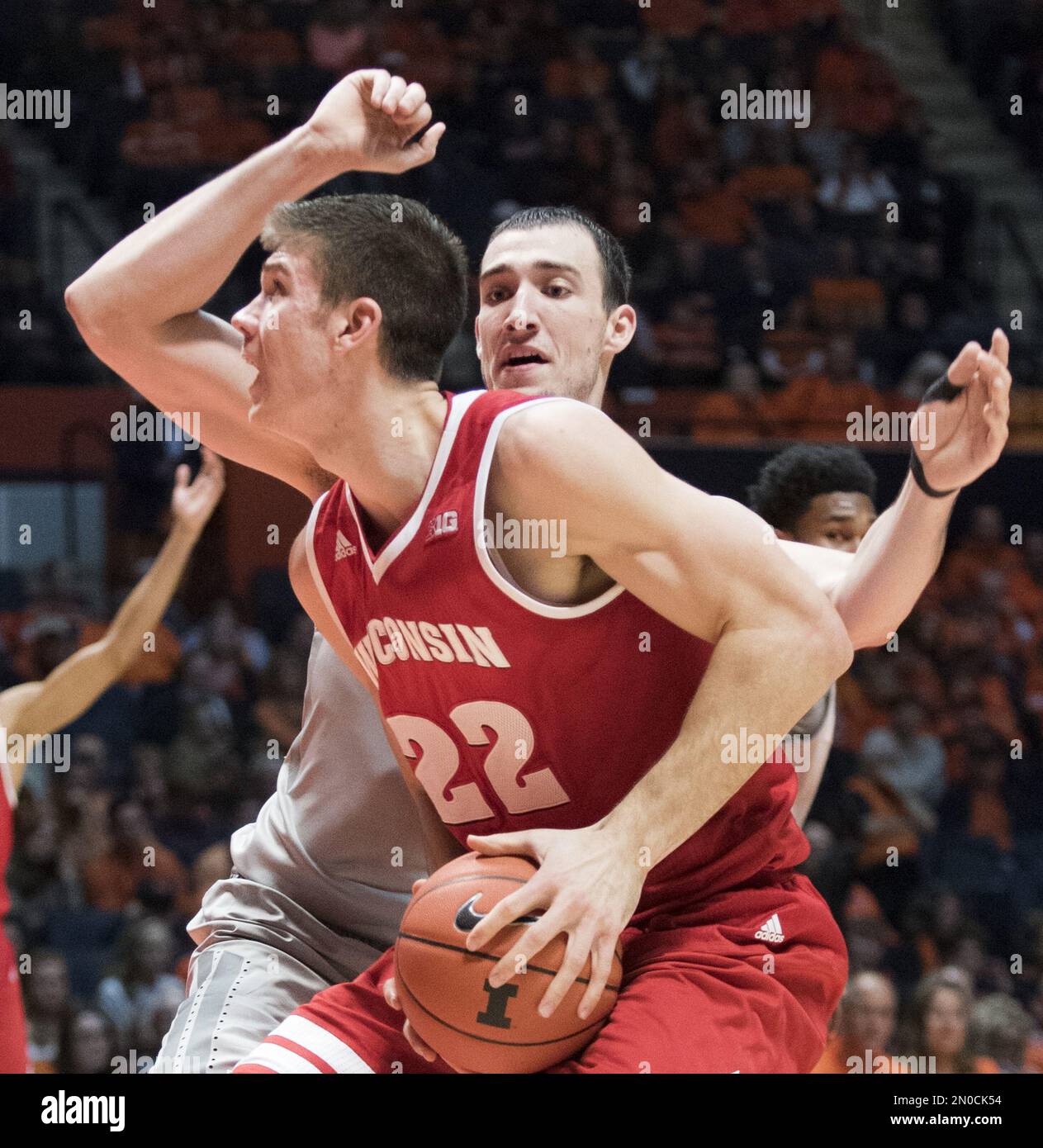 Illinois center Maverick Morgan (22) and Wisconsin's forward Ethan Happ ...