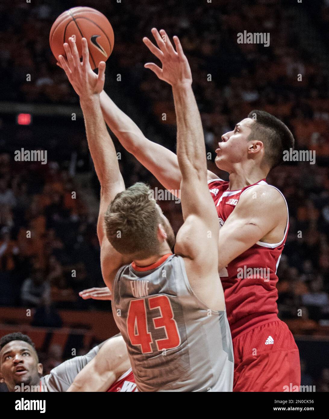 Wisconsin's guard Bronson Koenig (24) and Illinois forward Michael ...