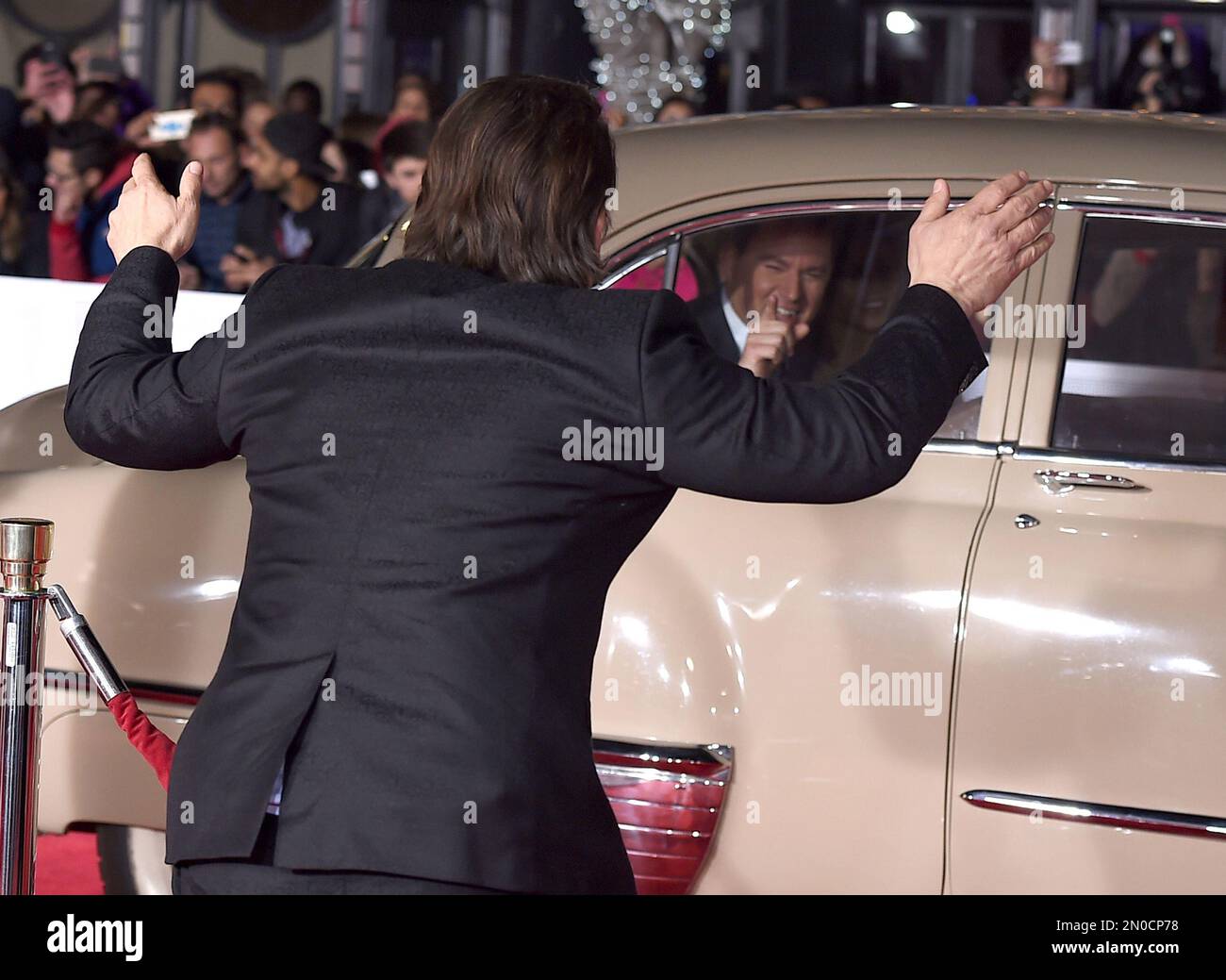 Channing Tatum points to Josh Brolin from the inside of a car as Tatum ...