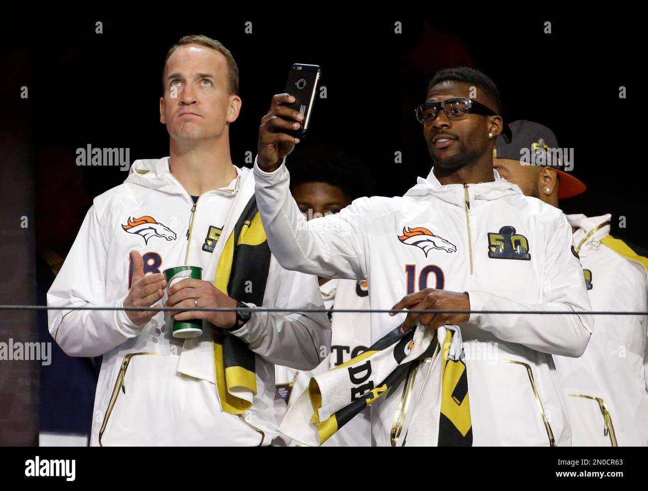 Denver Broncos' Peyton Manning and Emmanuel Sanders wait for the start ...
