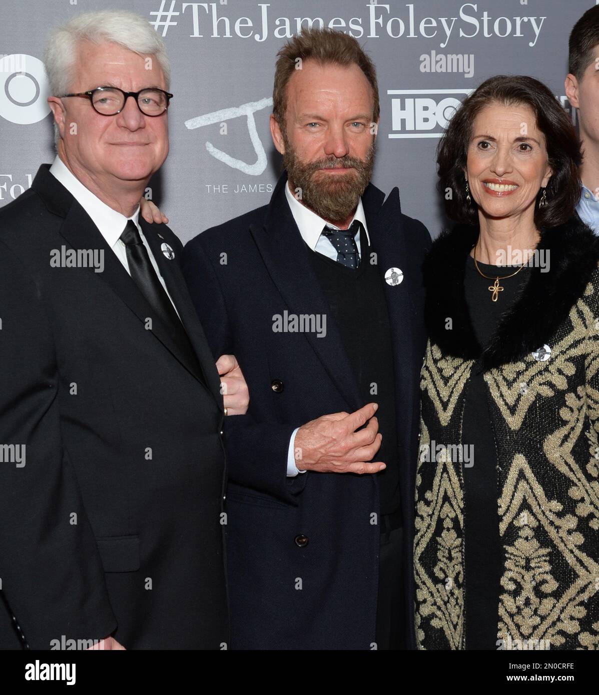 Musician Sting, center, poses with James Foley's parents John Foley ...