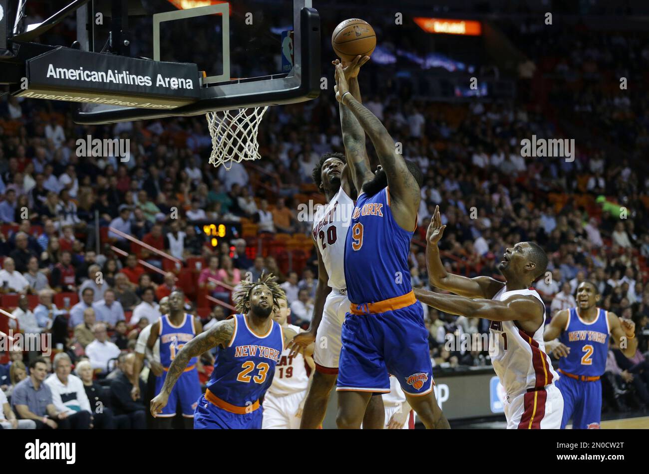 New York Knicks forward Kyle O'Quinn (9) shoots as Miami Heat forward ...