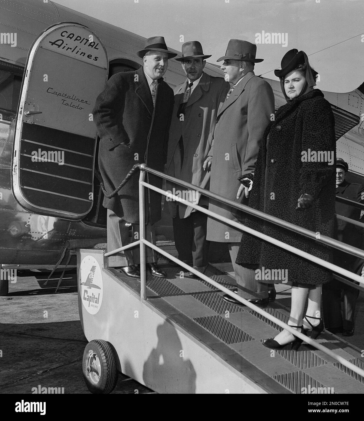Raymond Fernandez and Martha Beck stand on ramp of plane, March 15 ...