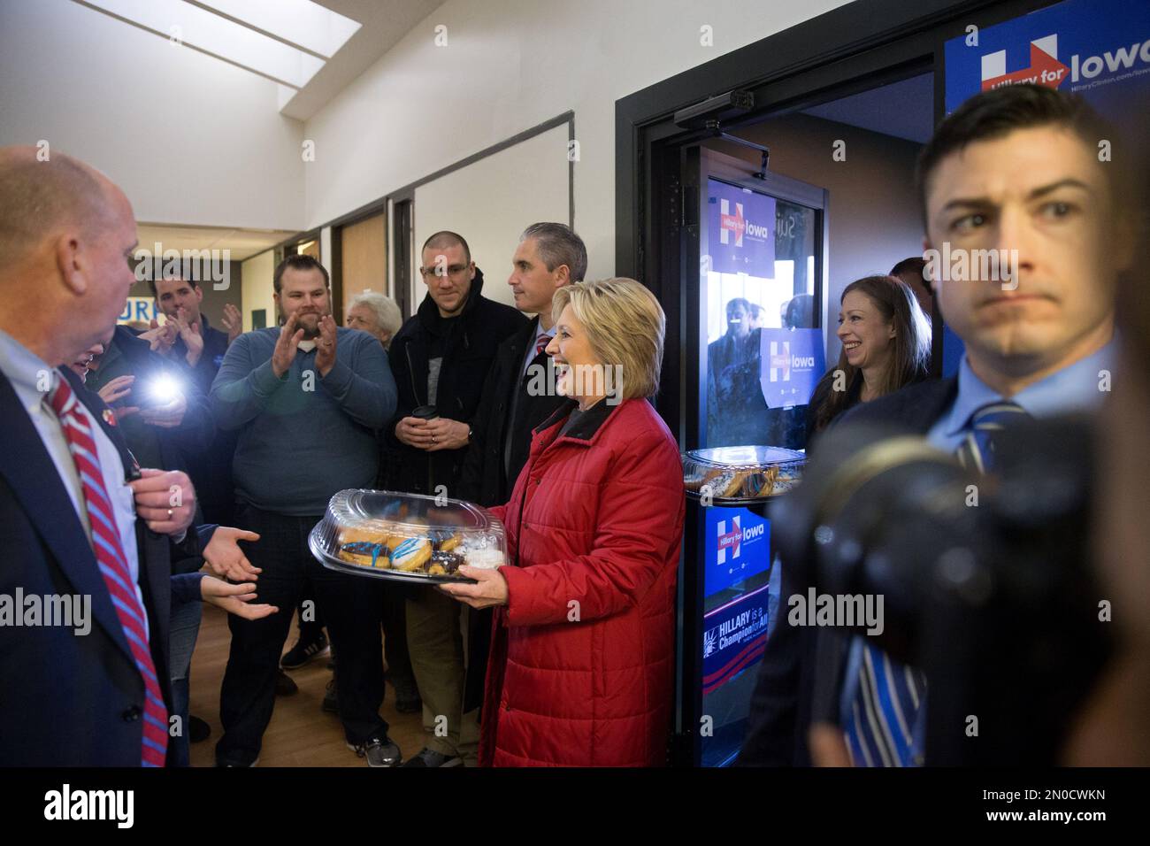 Democratic presidential candidate Hillary Clinton, followed by her ...