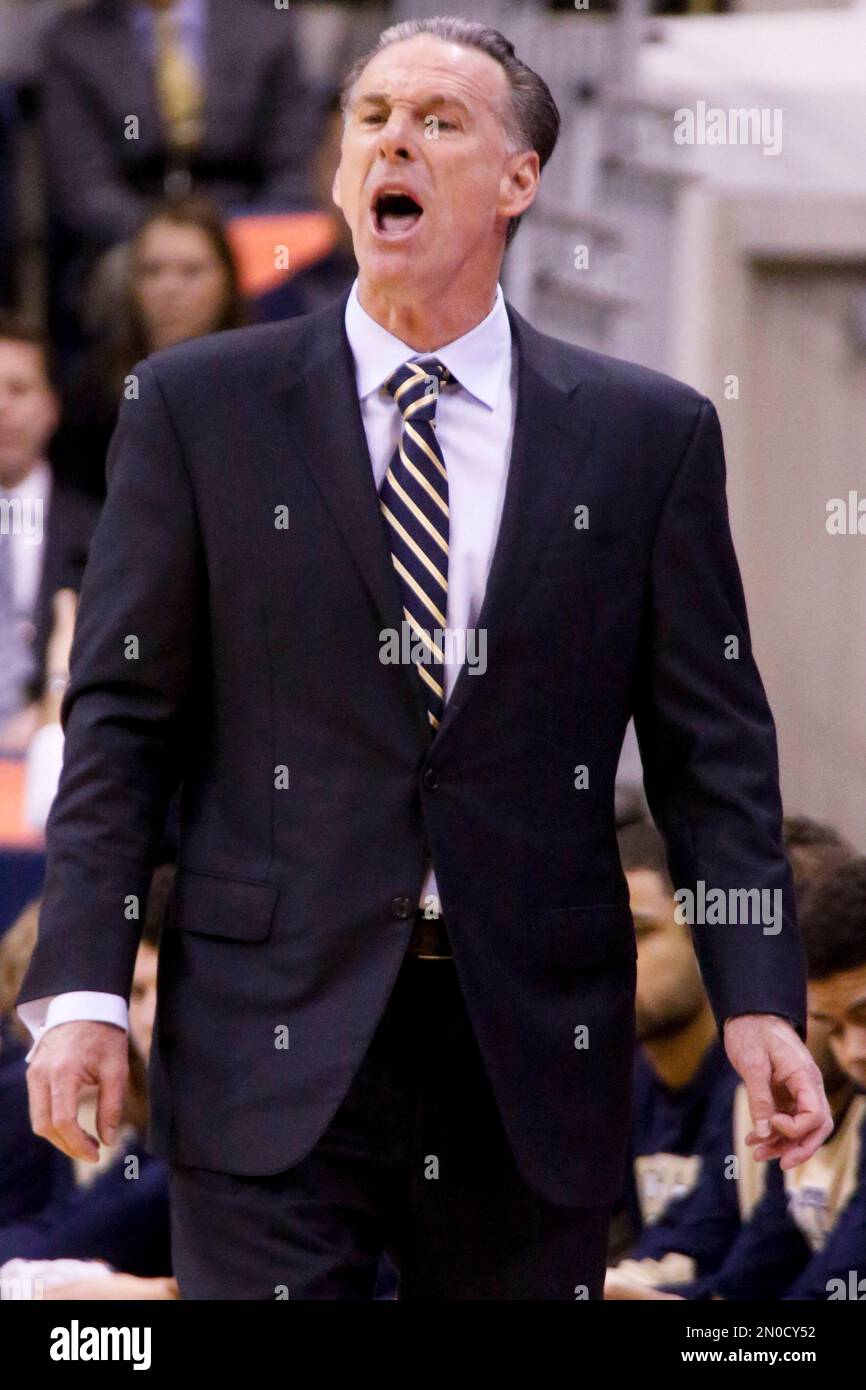 Pittsburgh head coach Jamie Dixon instructs his team against Virginia ...