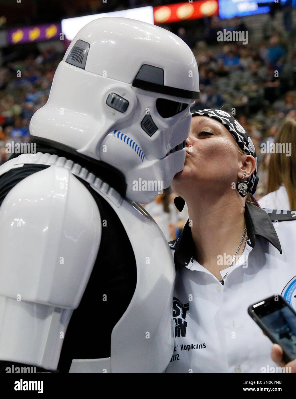 Sonya Hopkins of Arlington, Texas, kisses her husband Josh, who's ...