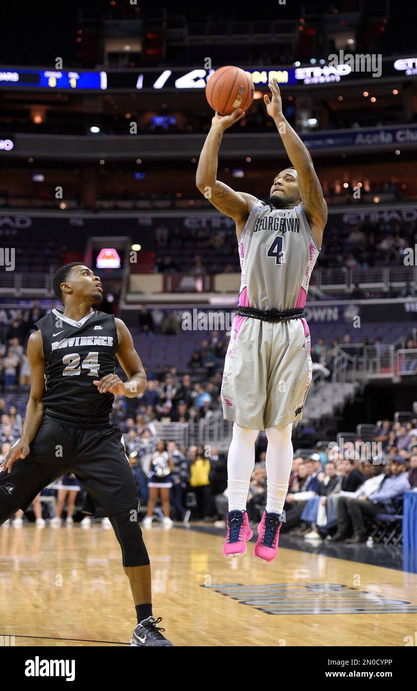 Georgetown guard D'Vauntes Smith-Rivera (4) takes a shot against ...