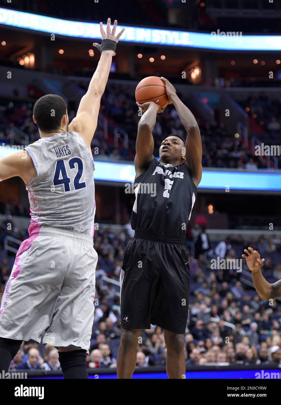 Providence forward Rodney Bullock (5) takes a shot against Georgetown ...
