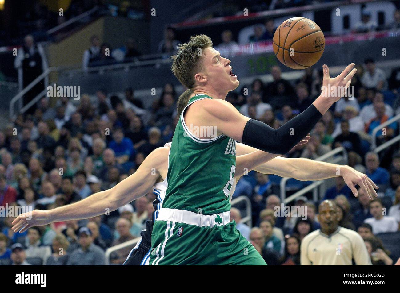 Boston Celtics forward Jonas Jerebko (8) is fouled by Orlando Magic ...