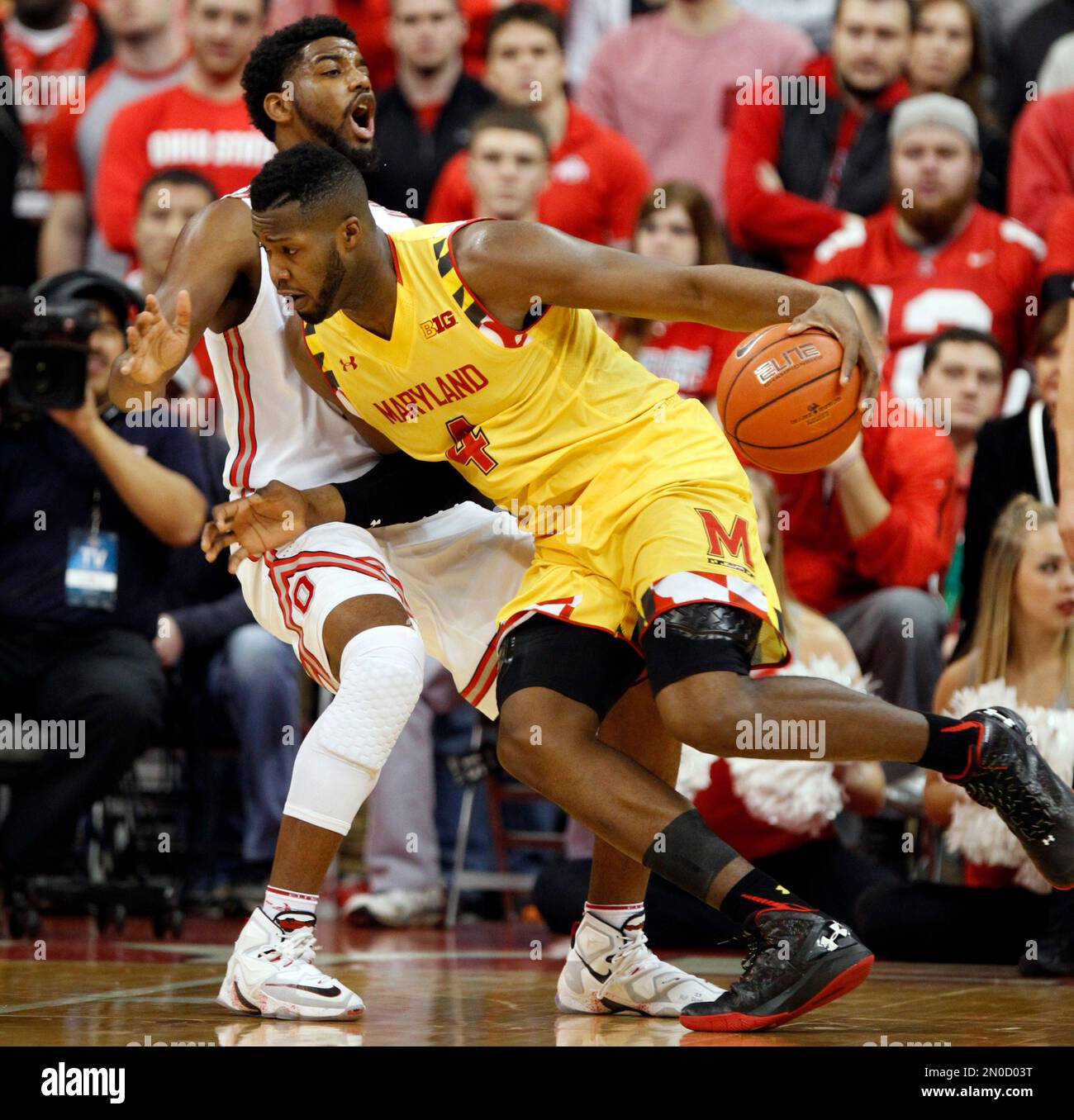 Maryland's Robert Carter, right, drives against Ohio State's JaQuan ...