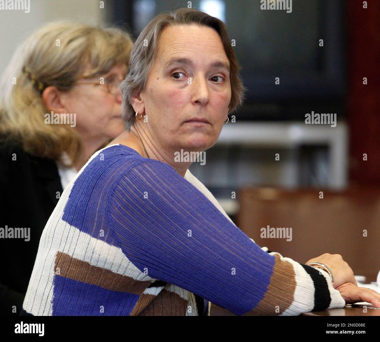 FILE - In this Sept. 17, 2012 file photo, Annette Smith watches in ...
