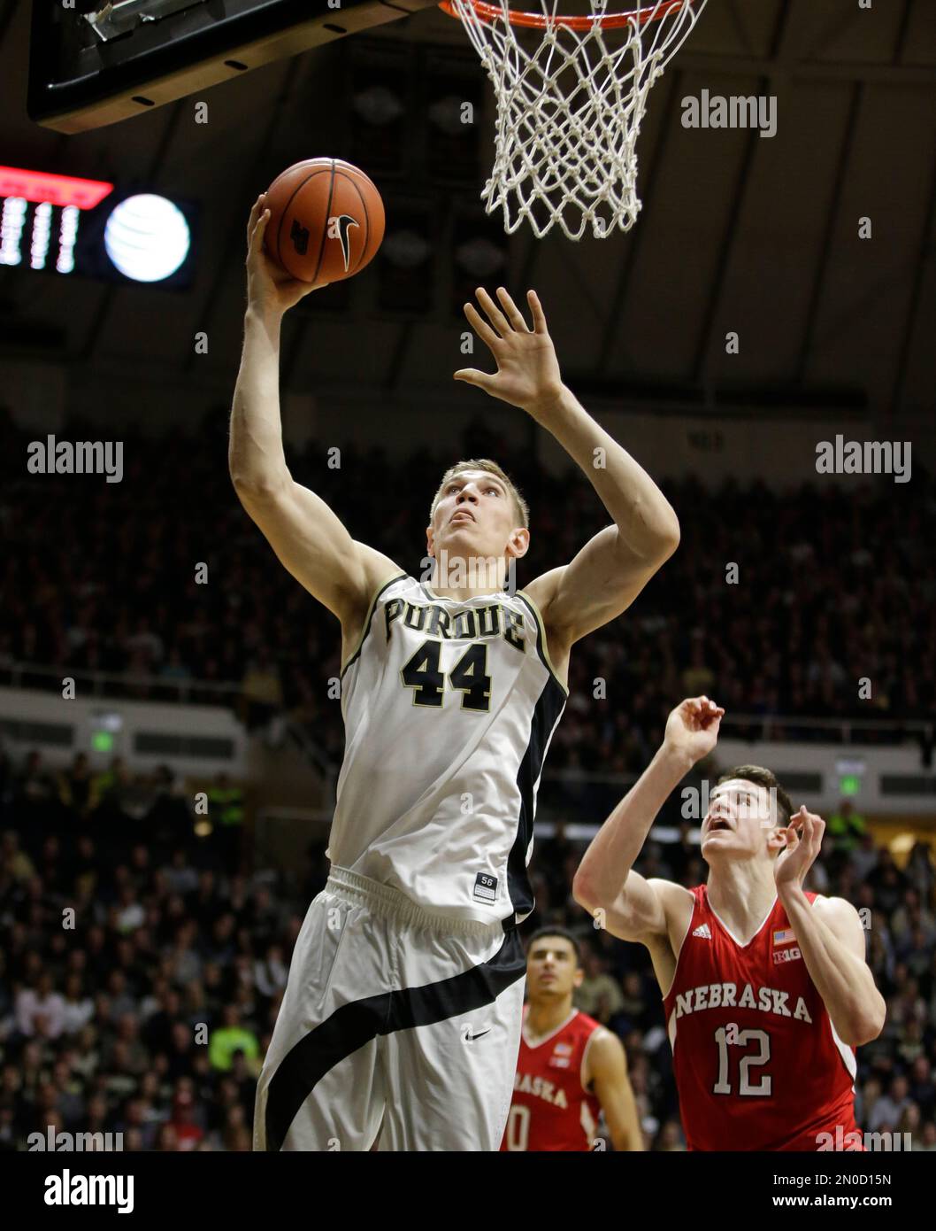 Purdue's Isaac Haas (44) shoots against Nebraska's Michael Jacobson (12 ...