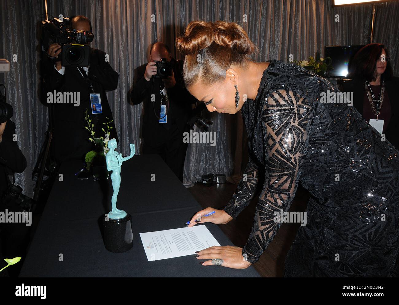 Queen Latifah poses backstage at the 22nd annual Screen Actors Guild ...