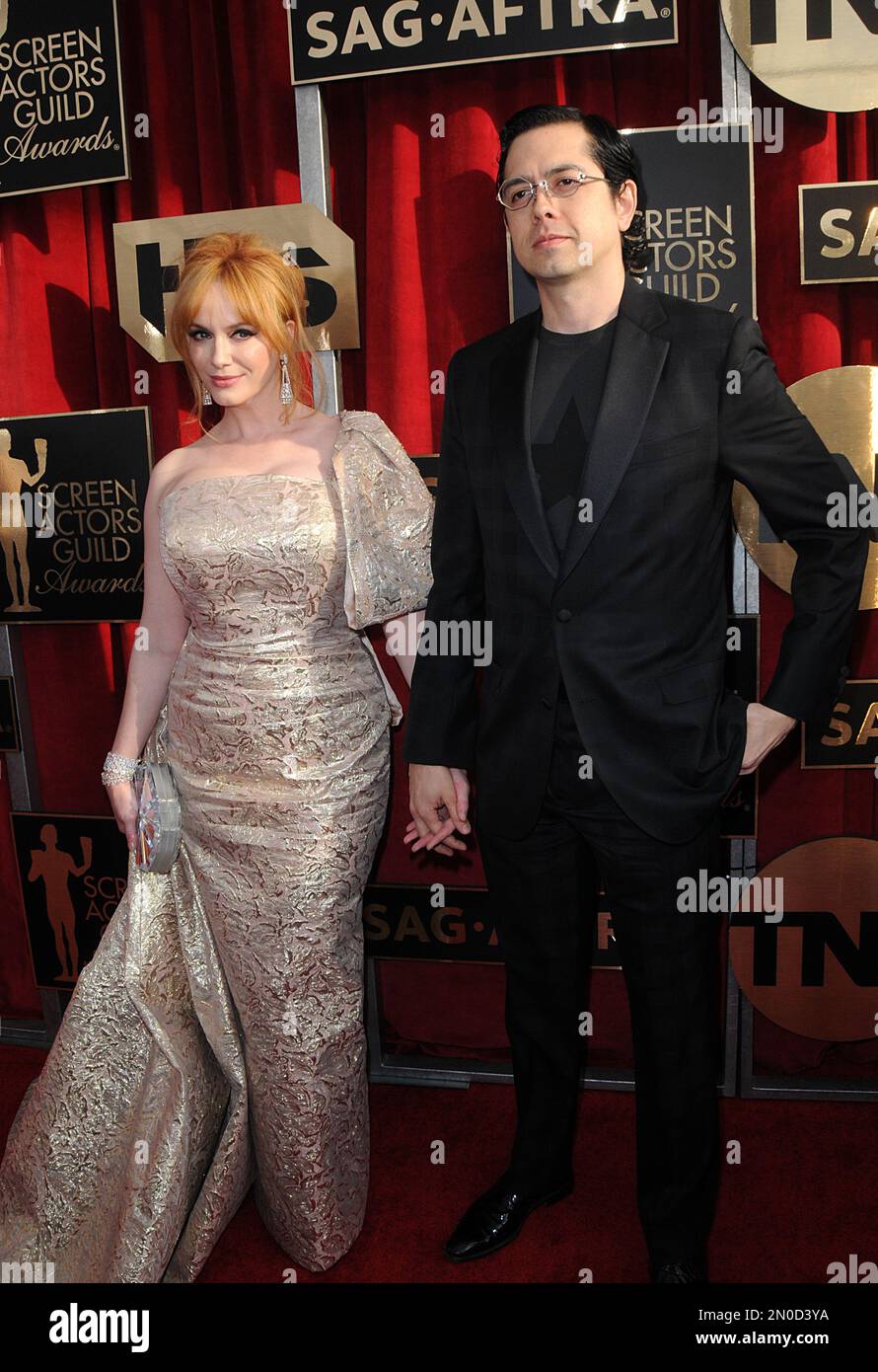 Christina Hendricks, left, and Geoffrey Arend arrive at the 22nd annual ...