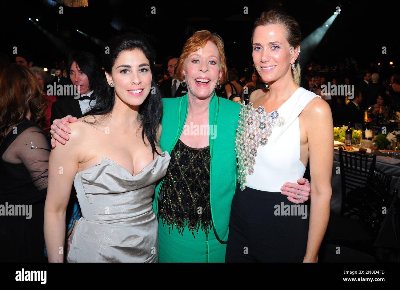 Sarah Silverman, from left, Carol Burnett and Kristen Wiig appear in ...