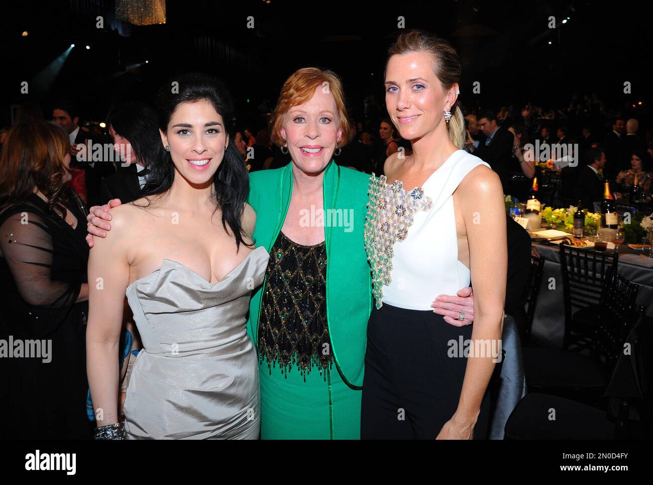 Sarah Silverman, from left, Carol Burnett and Kristen Wiig appear in ...