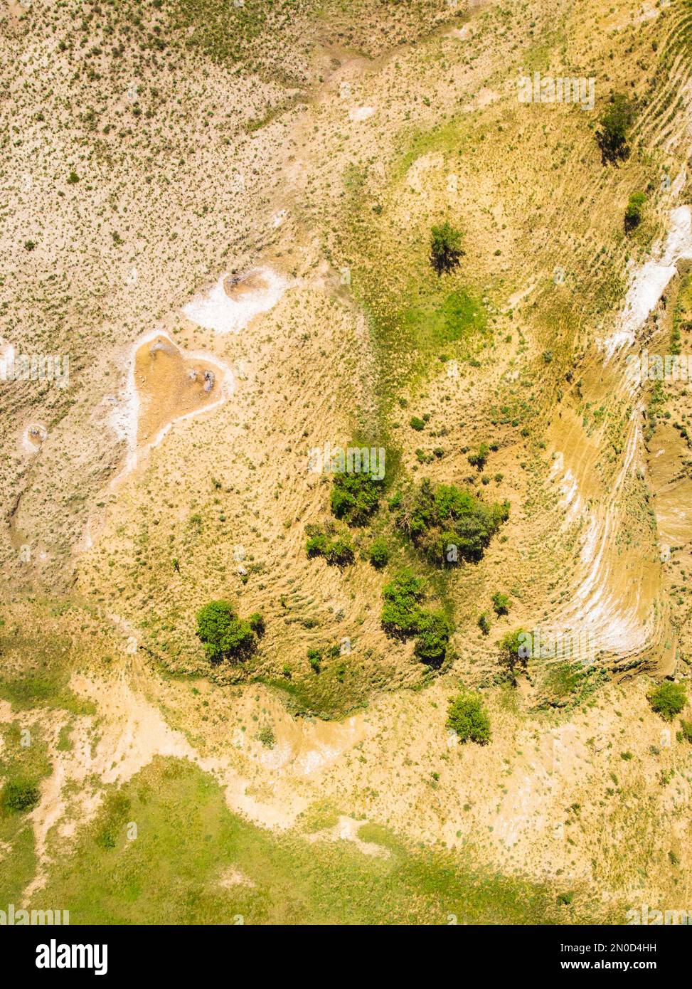 Top down view orange heart shape form on mud volcanoes site in chachuna ...