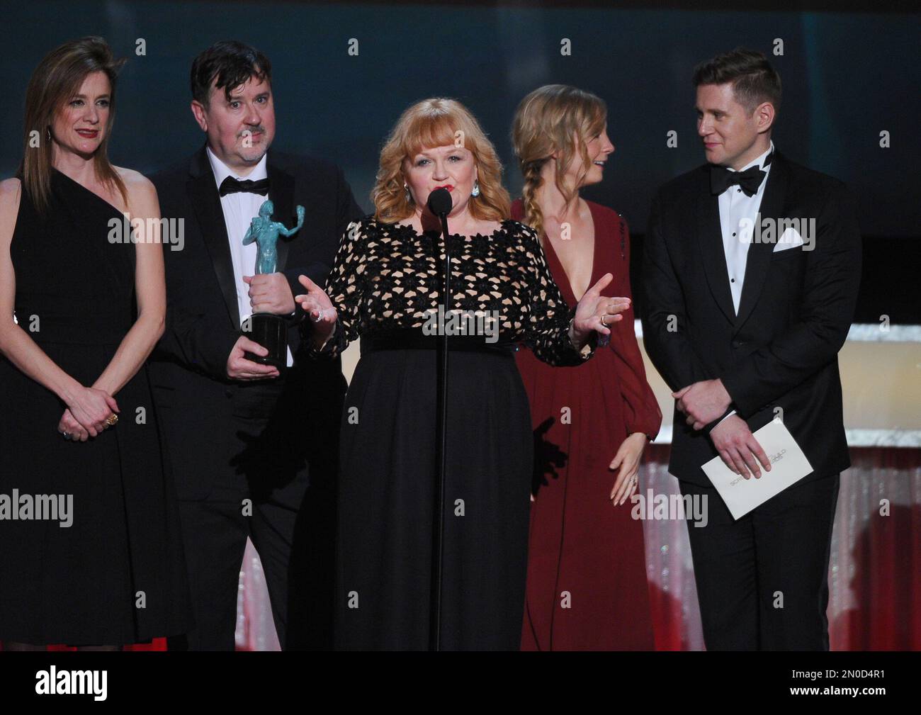 Lesley Nicol, center, and the cast and crew of “Downton Abbey” accept ...