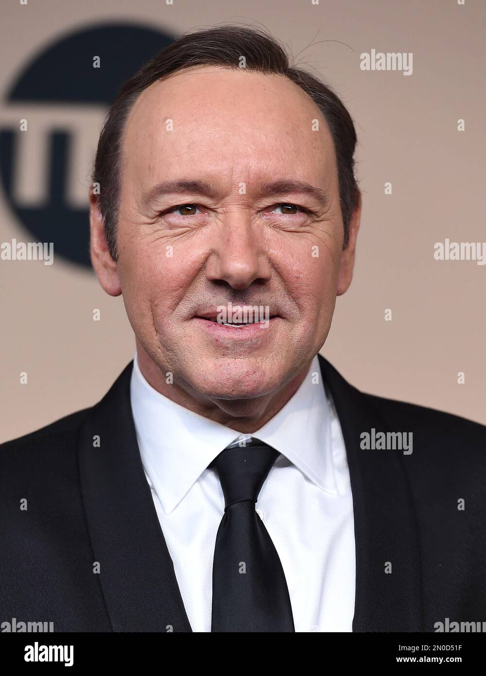 Kevin Spacey poses in the press room with the award for outstanding ...