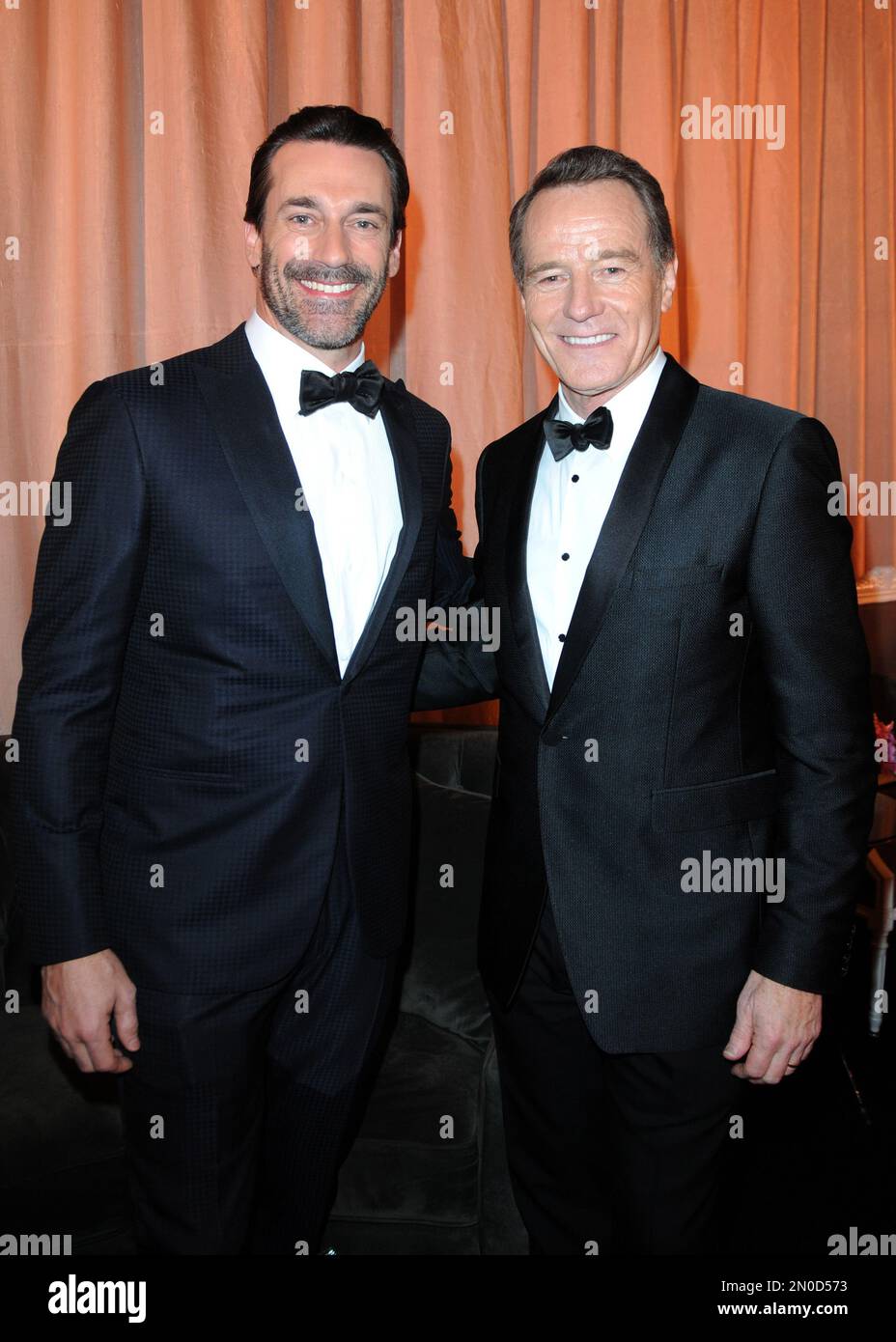 EXCLUSIVE - Jon Hamm, left, and Bryan Cranston pose in the green room ...