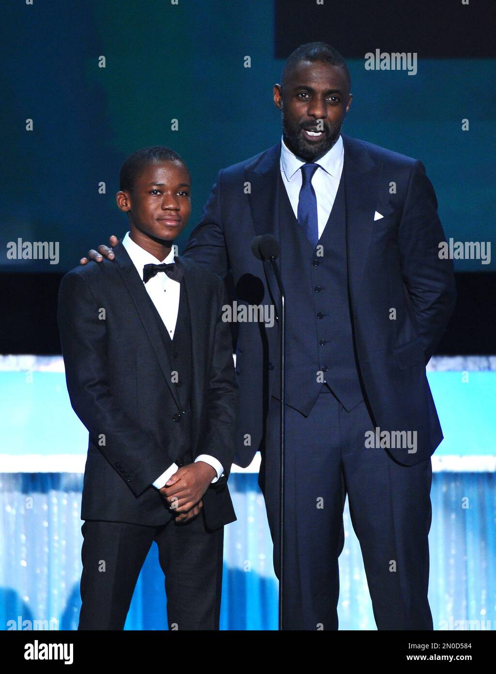 Abraham Attah, left, and Idris Elba introduce their film “Beasts of No ...