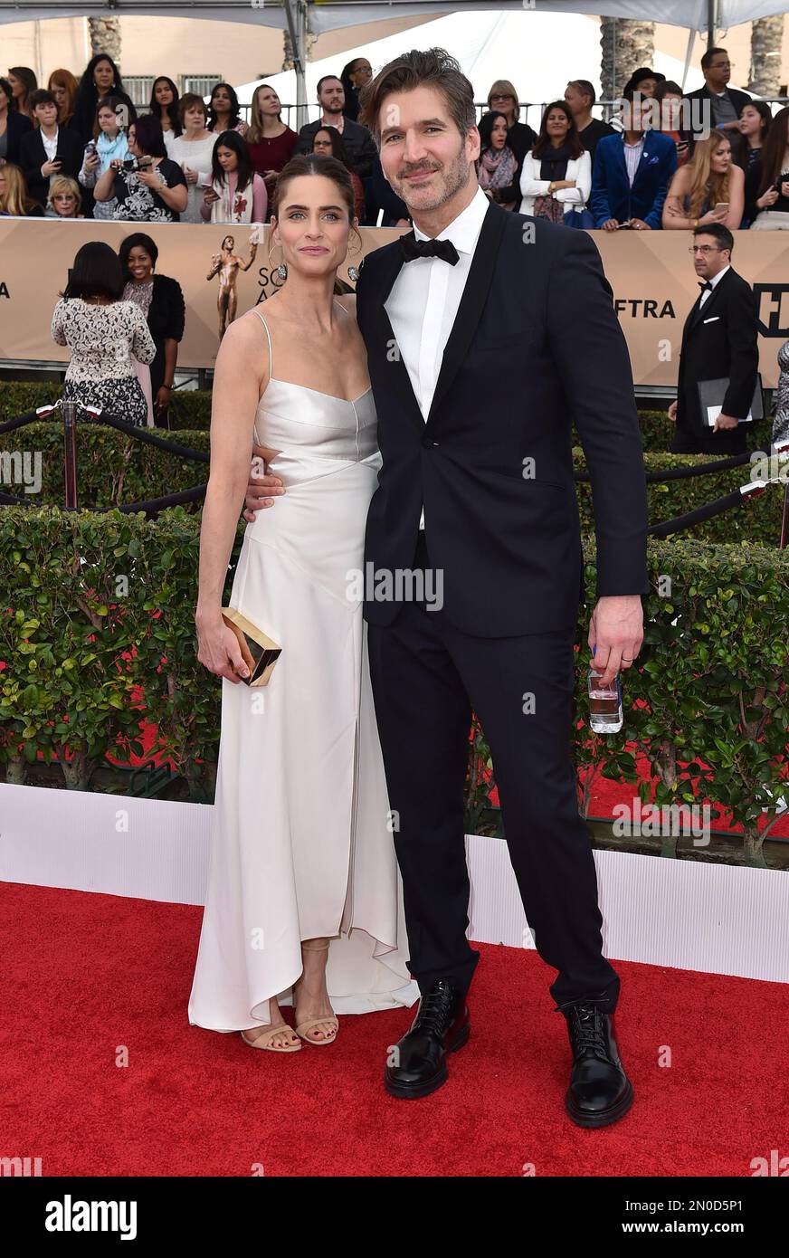 Amanda Peet, left, and David Benioff arrive at the 22nd annual Screen ...