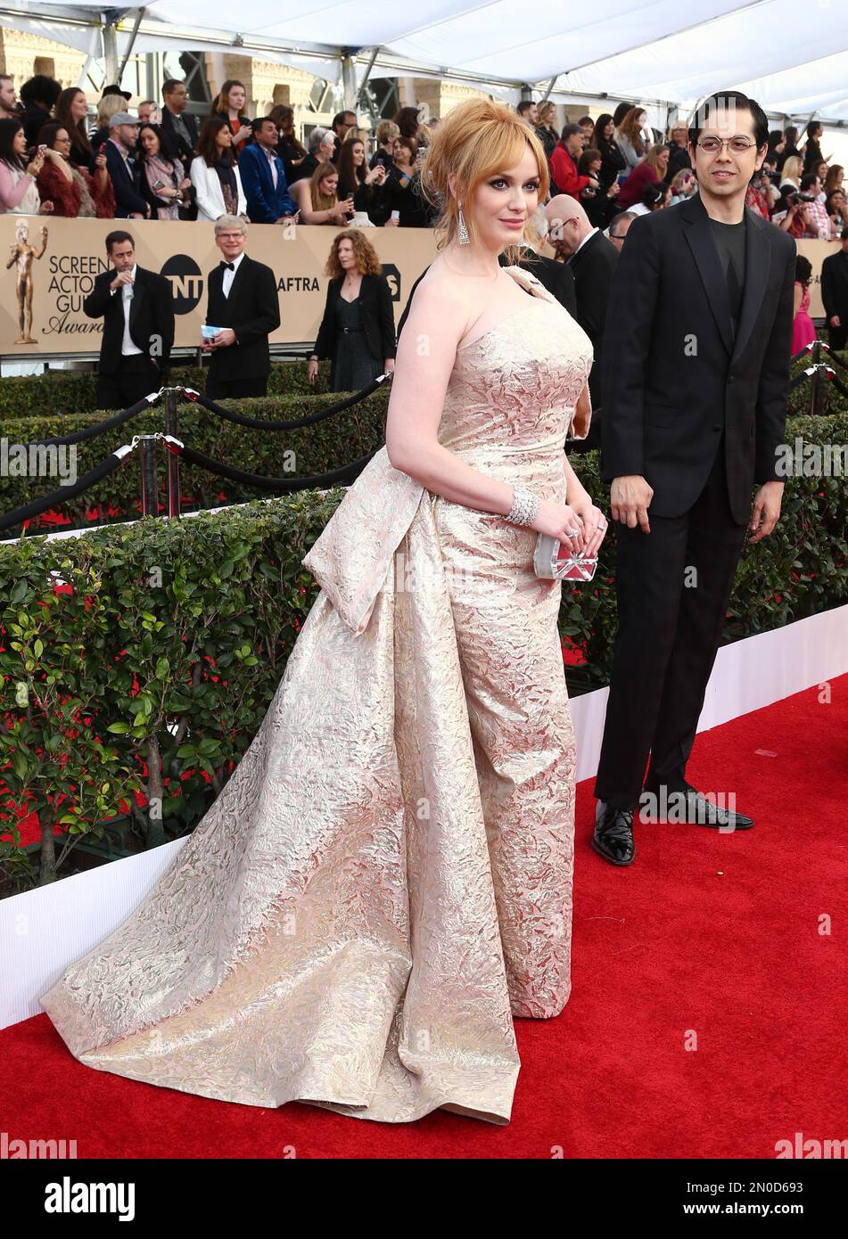 Christina Hendricks, left, and Geoffrey Arend arrive at the 22nd annual ...